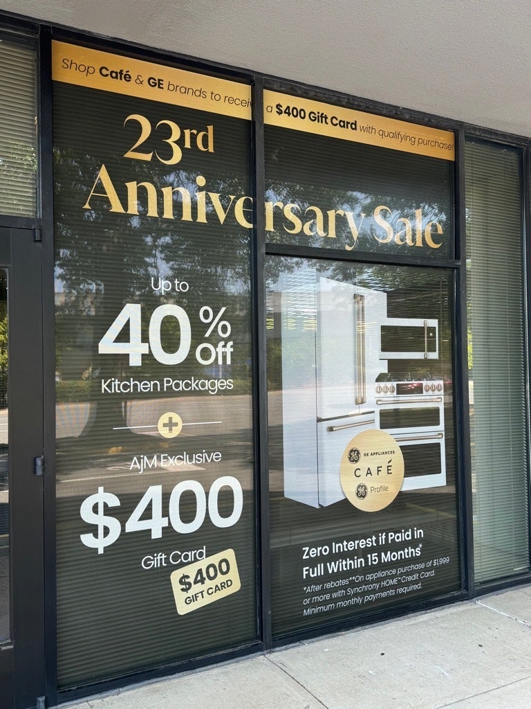 Celebrate AJ Madison’s 20+ Years with Stunning Window Graphics by ...