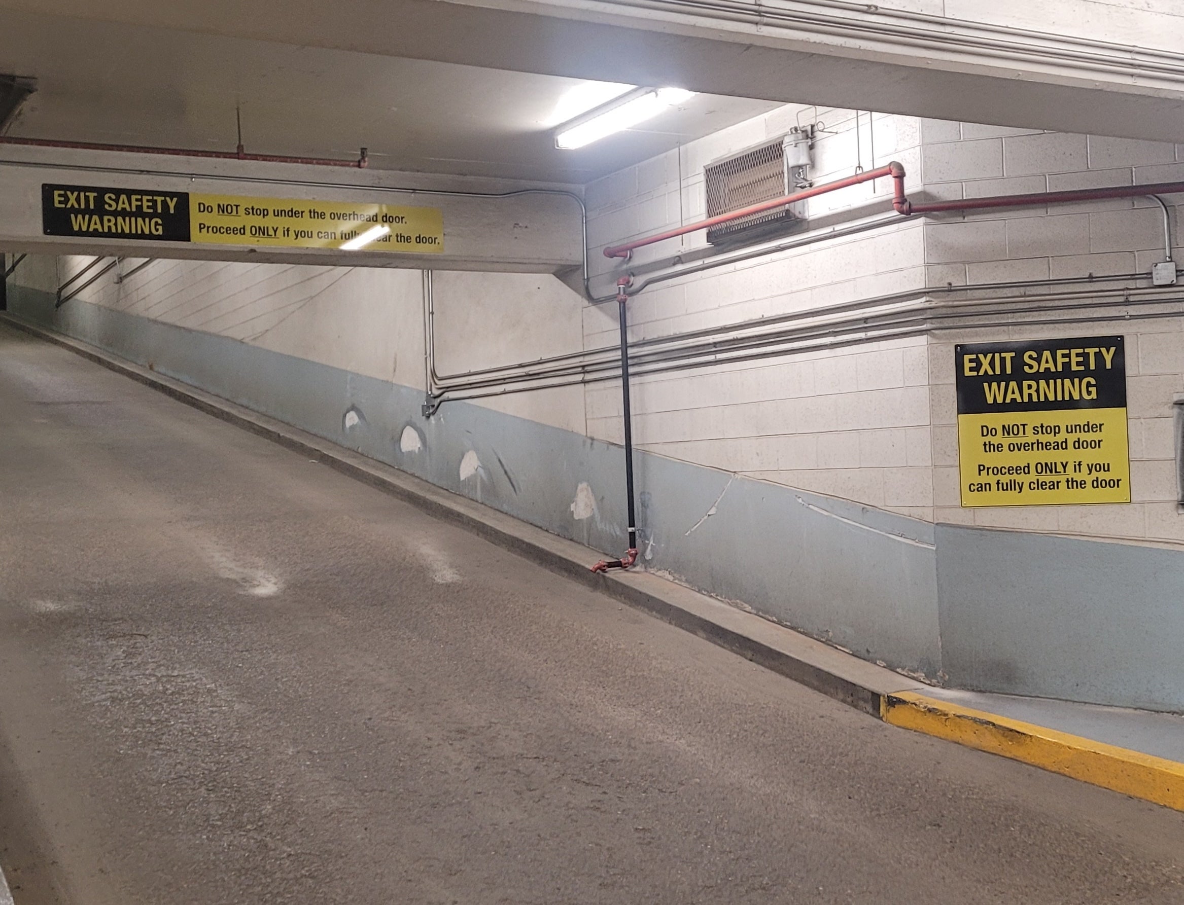 Parkade Signage for Maple Leaf Property Management in Edmonton, AB