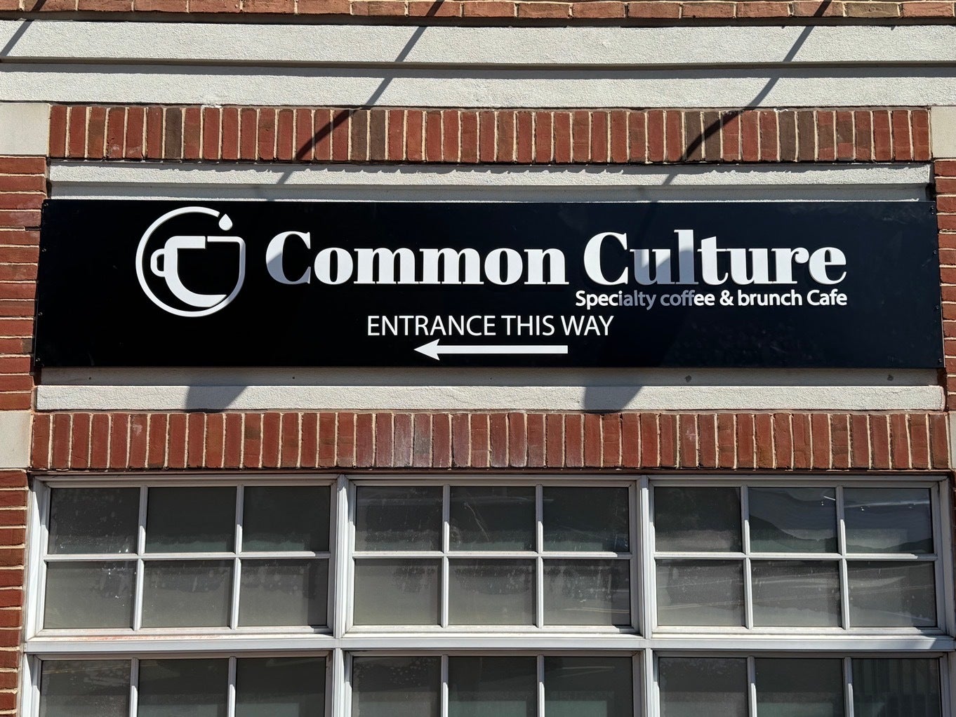 Sleek Black and White Acrylic Sign for Common Culture Coffee in Fairfax