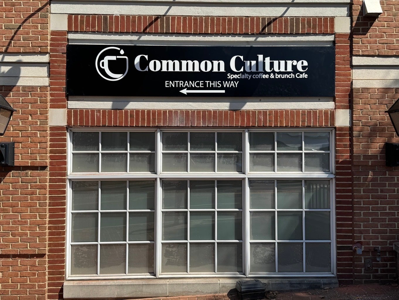 Sleek Black and White Acrylic Sign for Common Culture Coffee in Fairfax