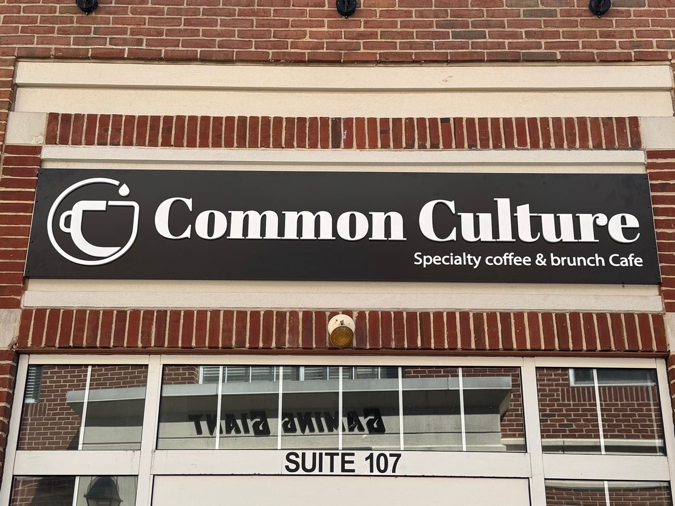 Sleek Black and White Acrylic Sign for Common Culture Coffee in Fairfax