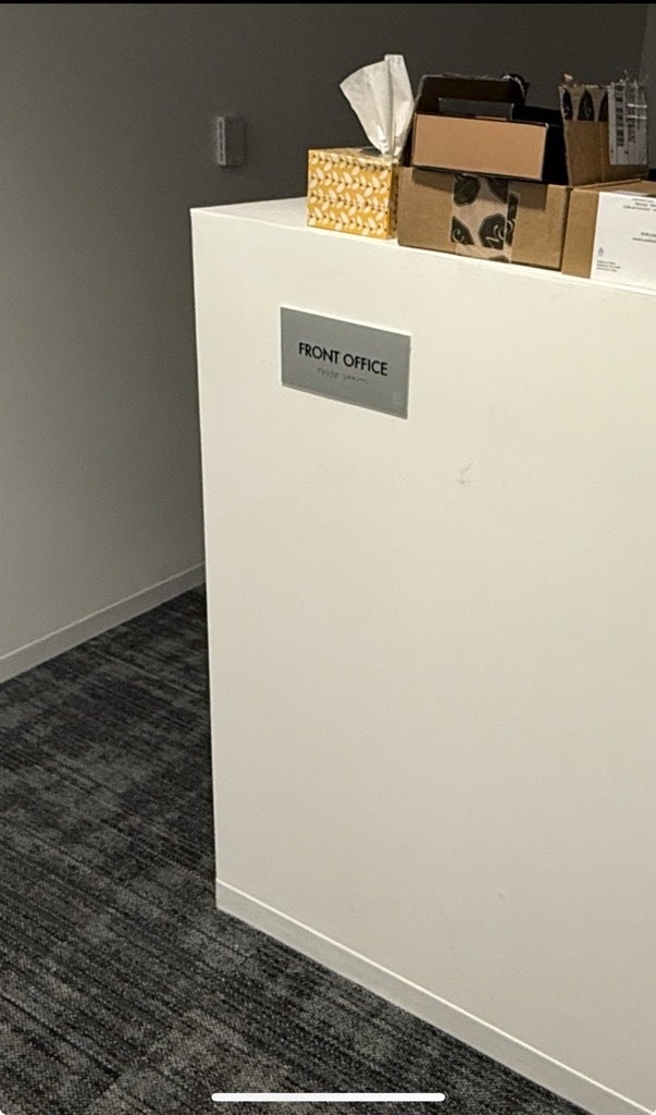 Premium Stainless Steel Room Signs for The Amatriot Group: Elevating a Modern Office Space