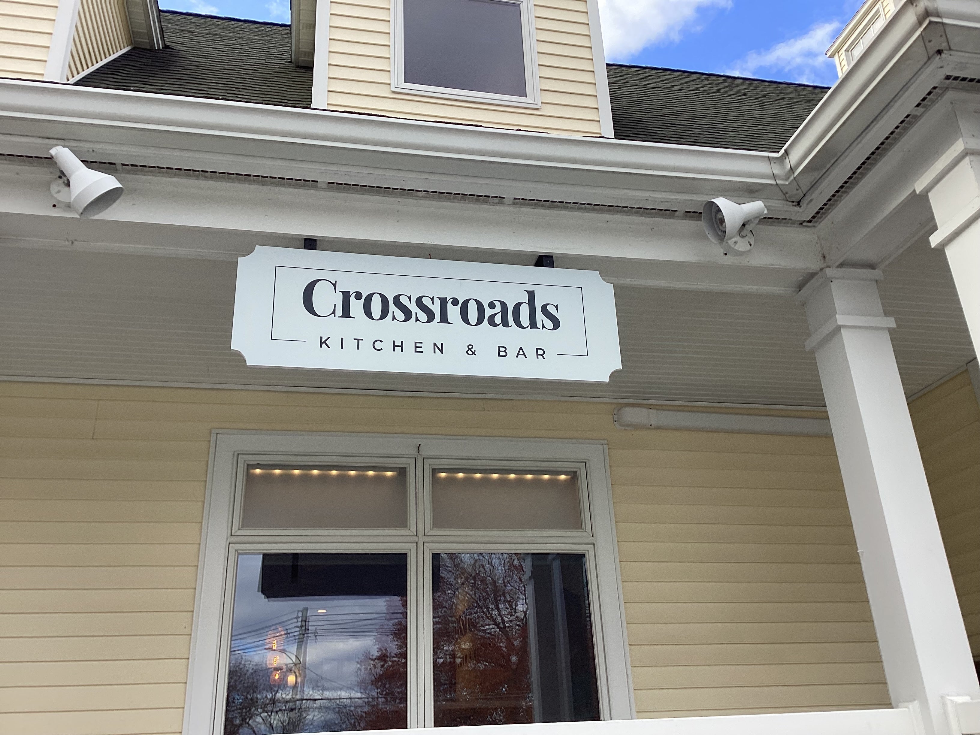 Hanging Sign Installation for New England Property Management ...