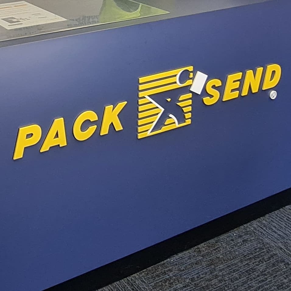 Installed Building and Reception Signage for Pack & Send