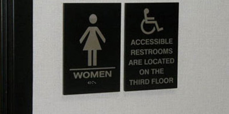 Accessibility signs that meet regulatory requirements